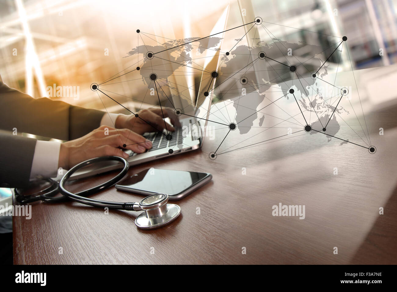 Doctor working at workspace with laptop computer in medical workspace ...