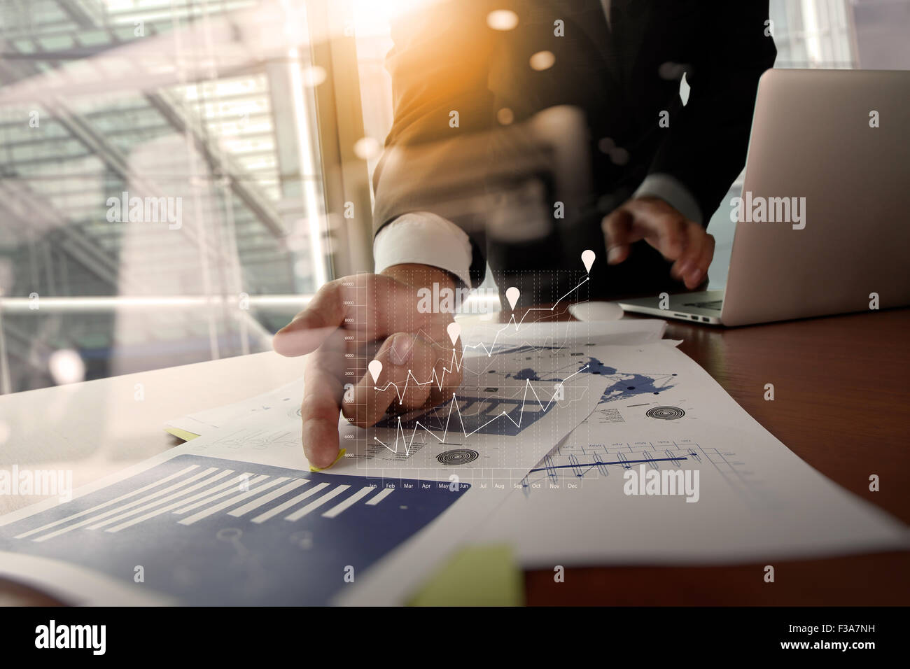 Double exposure of business man hand working on blank screen laptop ...