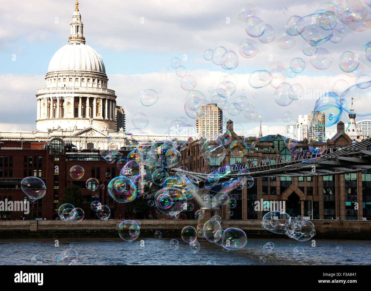St Paul's Cathedral and Millennium Bridge seen through bubbles Stock ...