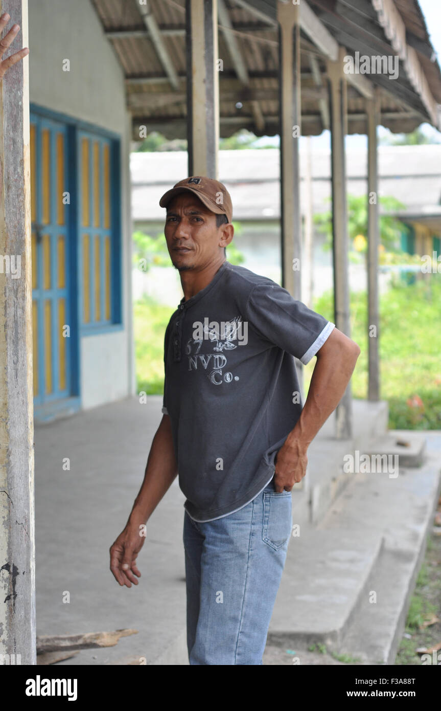 Local man of Midai Island, northern Indonesia Stock Photo - Alamy