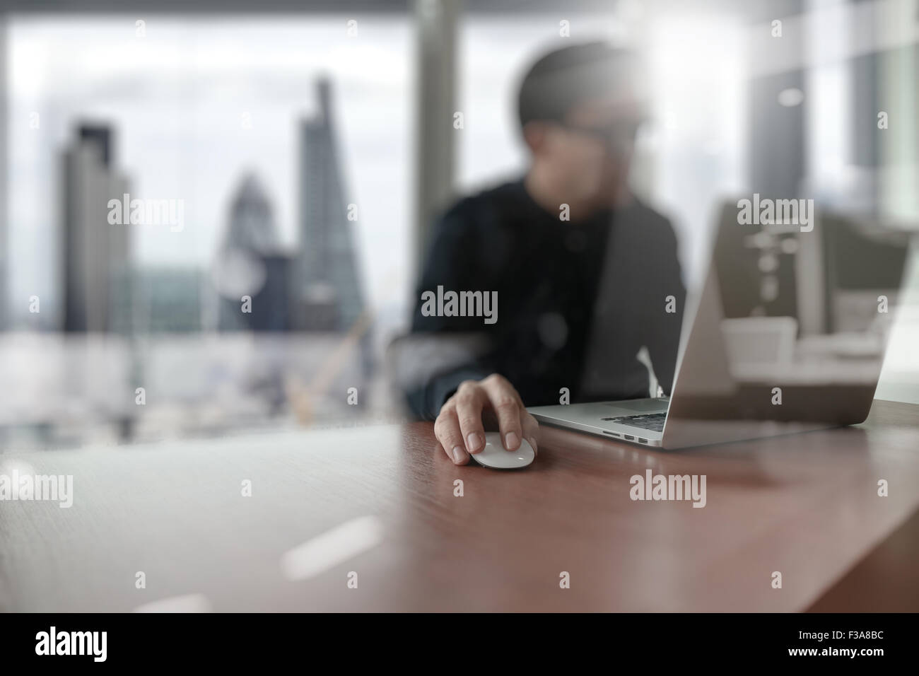 Young creative designer man working at office with computer laptop as ...
