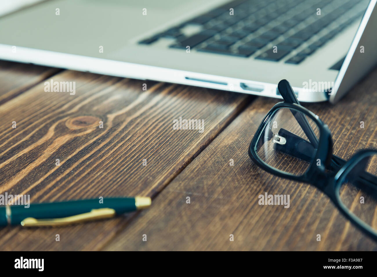 Laptop and diary on the desk Stock Photo - Alamy