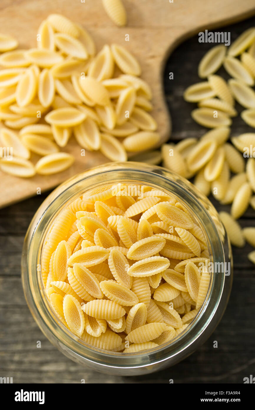 uncooked italian pasta in jar Stock Photo - Alamy