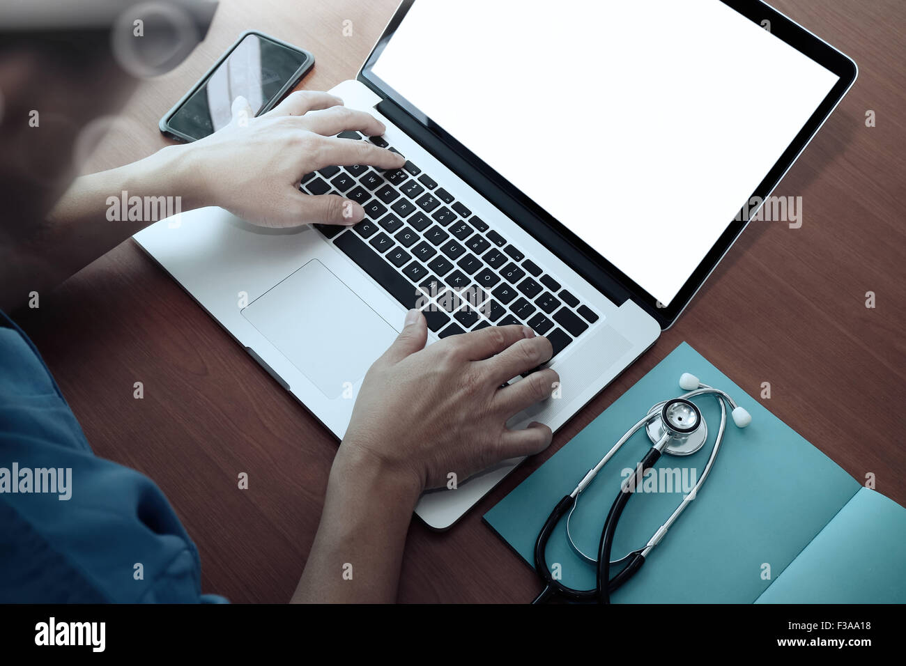 top view of Medicine doctor hand working with modern computer and smart ...