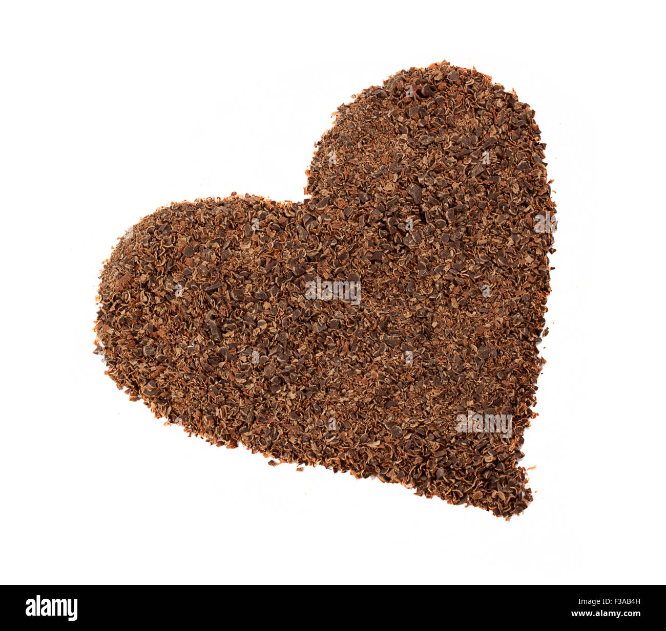 chocolate chips placer in the shape of heart isolated on white ...