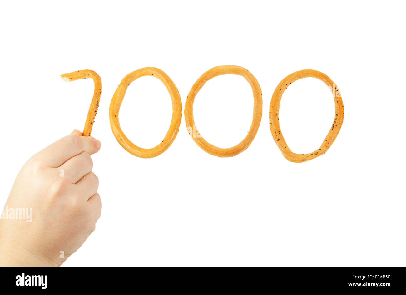Hand puts the number one thousand of bagels isolated on white ...