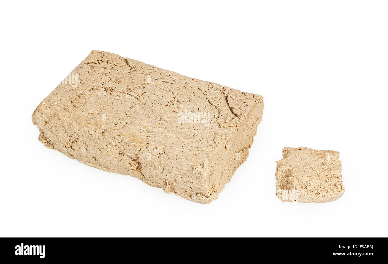piece of halva isolated on white background Stock Photo - Alamy