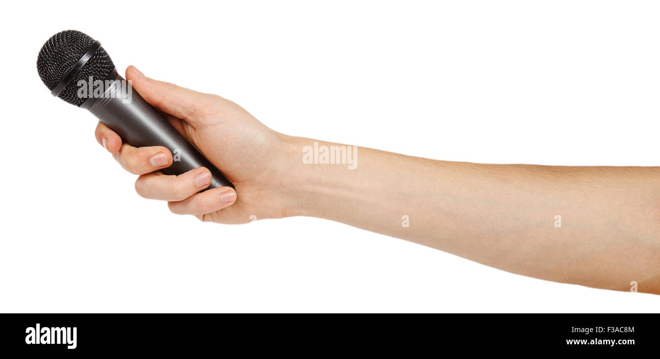 Black microphone in the hand isolated on white background Stock Photo ...