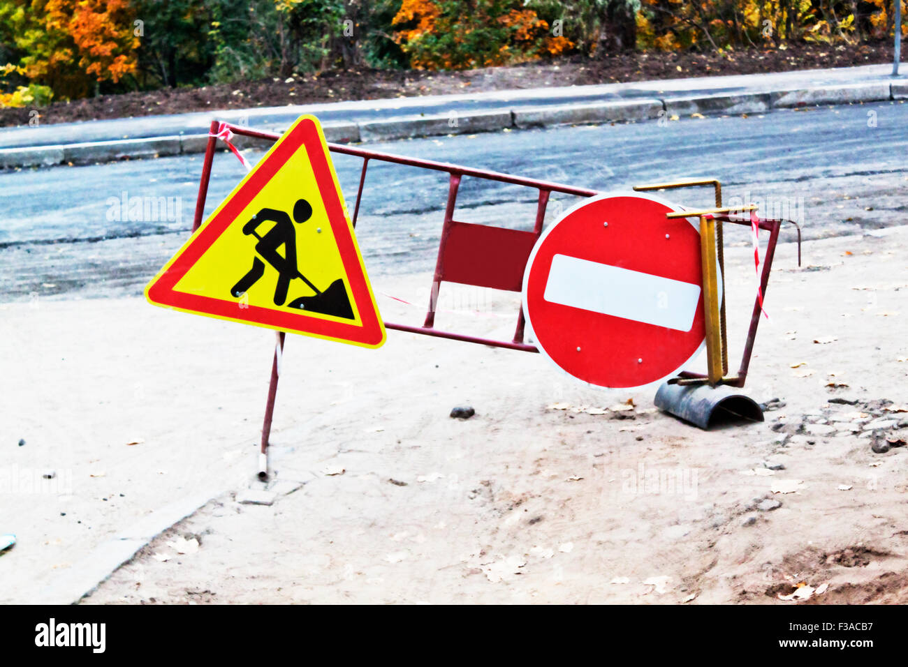 Road signs on road repair Stock Photo - Alamy