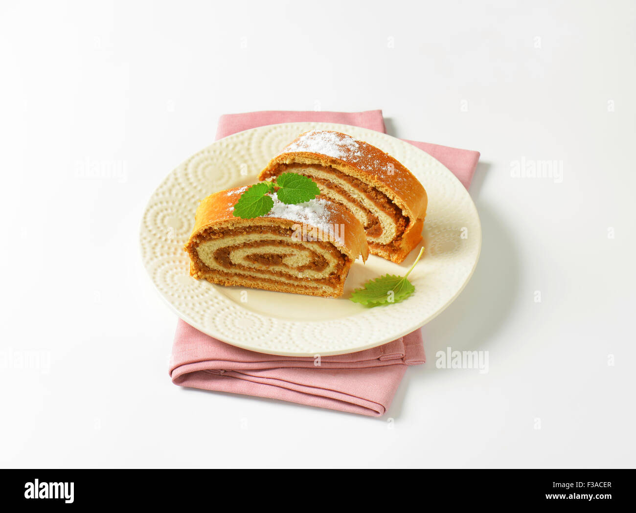 Slices of sweet nut roll Stock Photo - Alamy