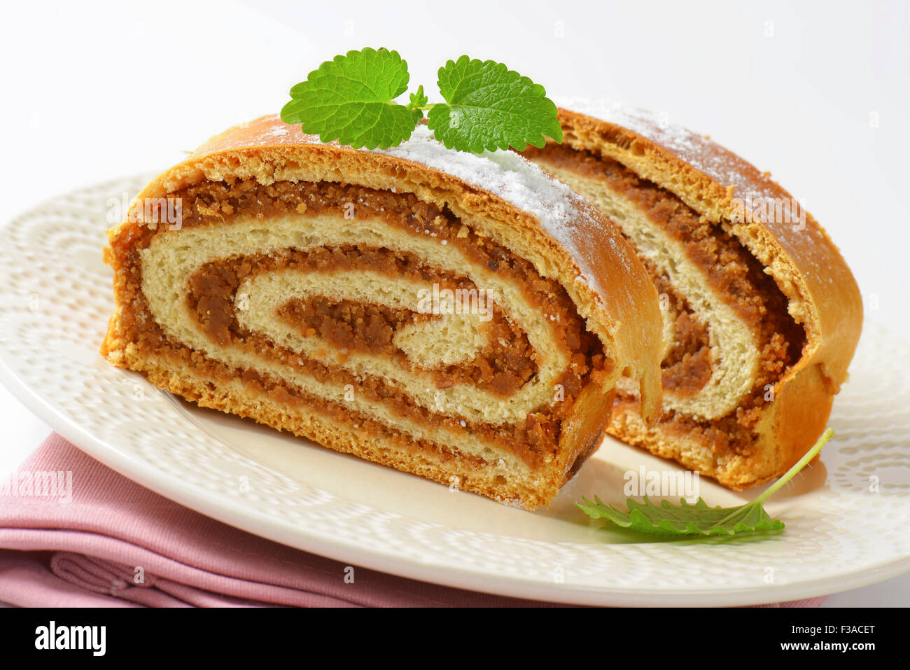 Slices of sweet nut roll Stock Photo - Alamy