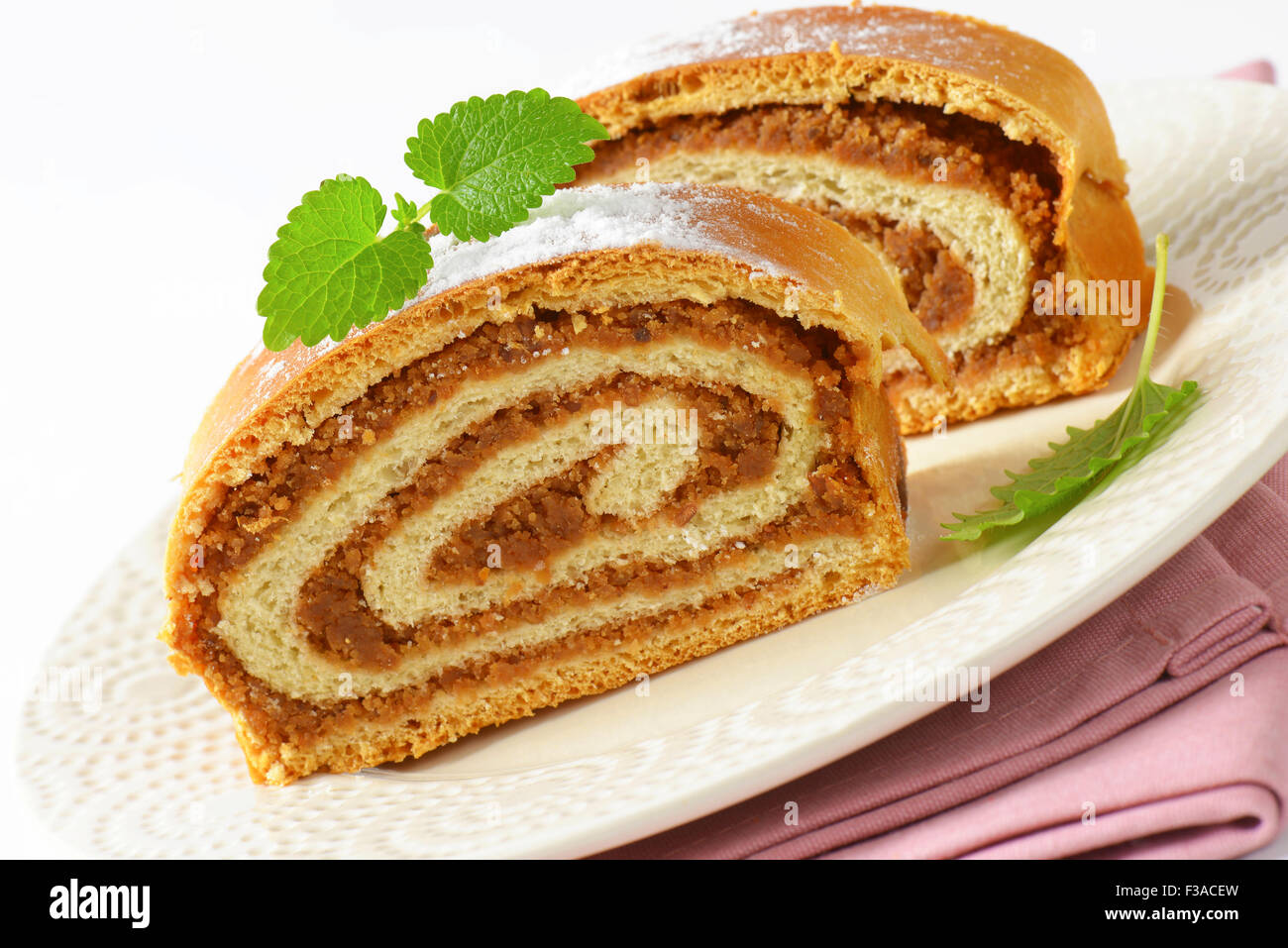 Slices of sweet nut roll Stock Photo - Alamy
