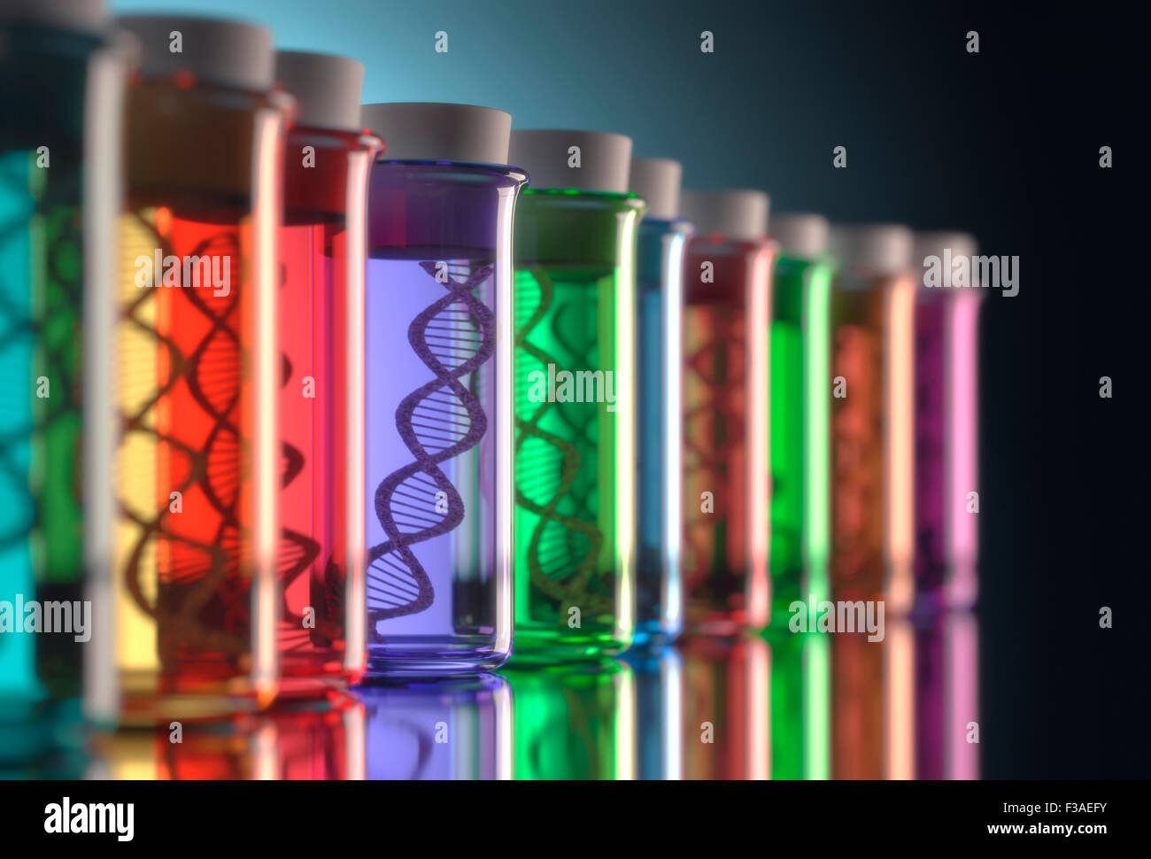 Coloured test tubes containing a DNA (deoxyribonucleic acid) double ...