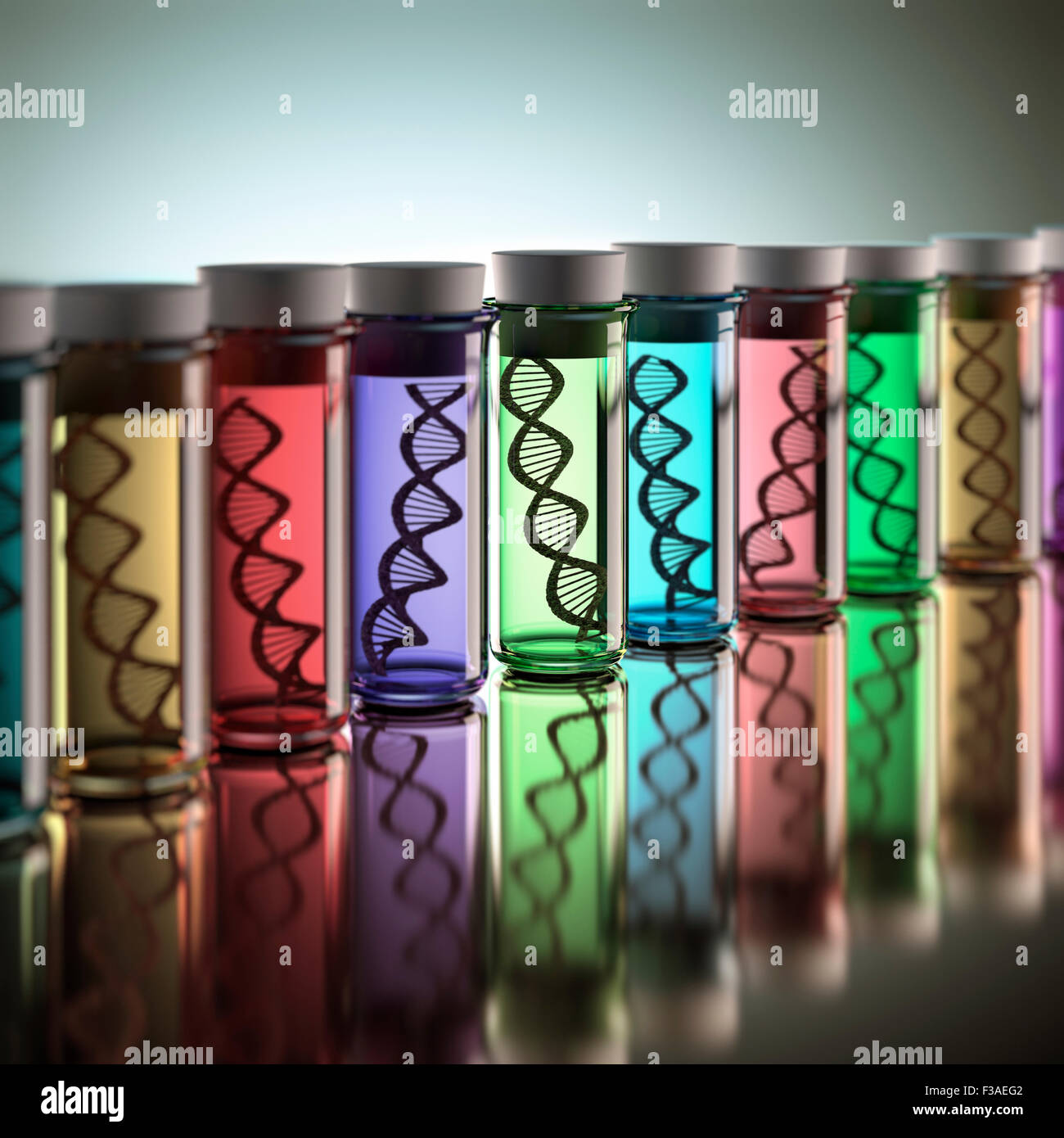 Coloured test tubes containing a DNA (deoxyribonucleic acid) double ...