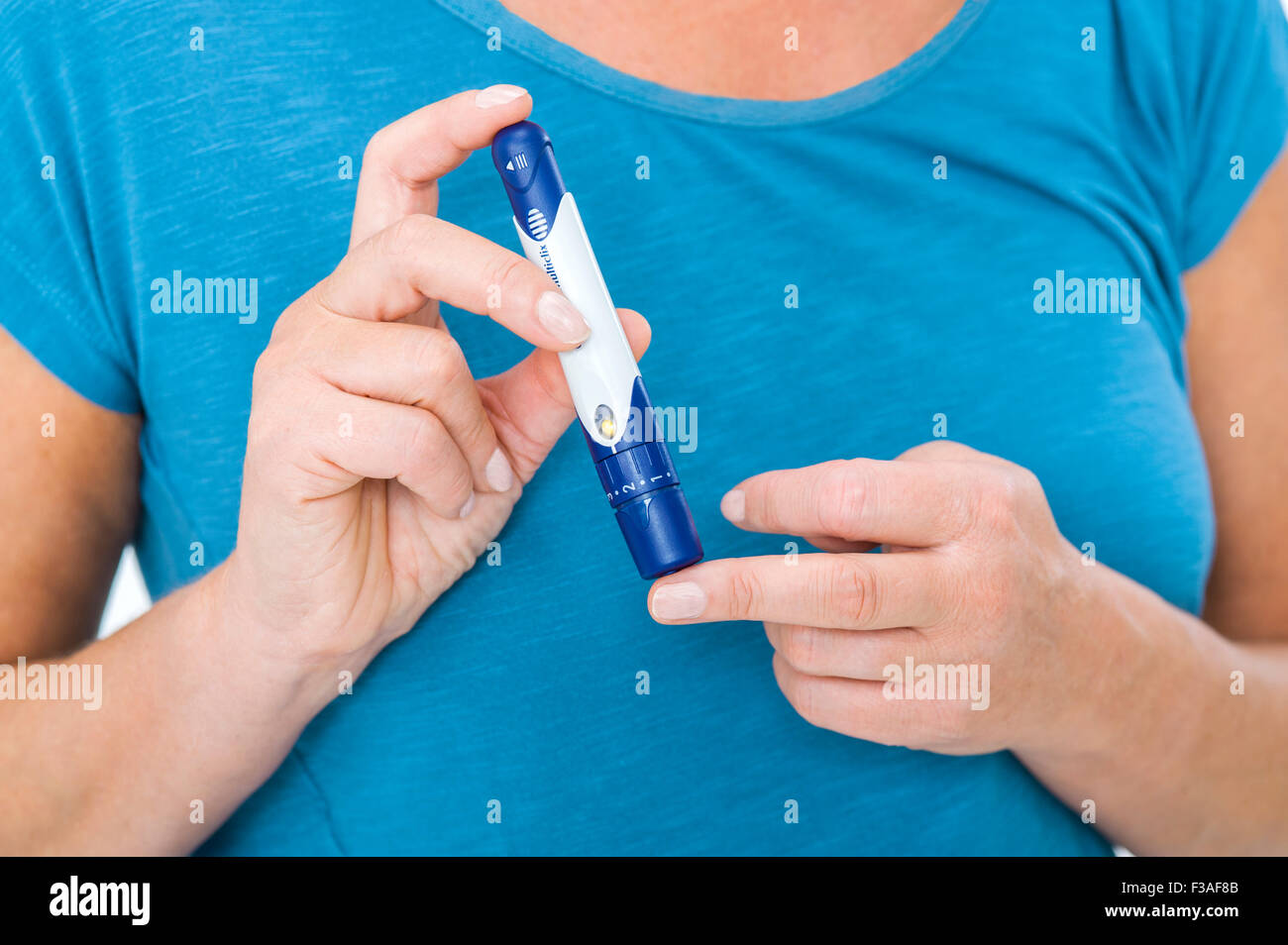 Fingerprick blood test hi-res stock photography and images - Alamy