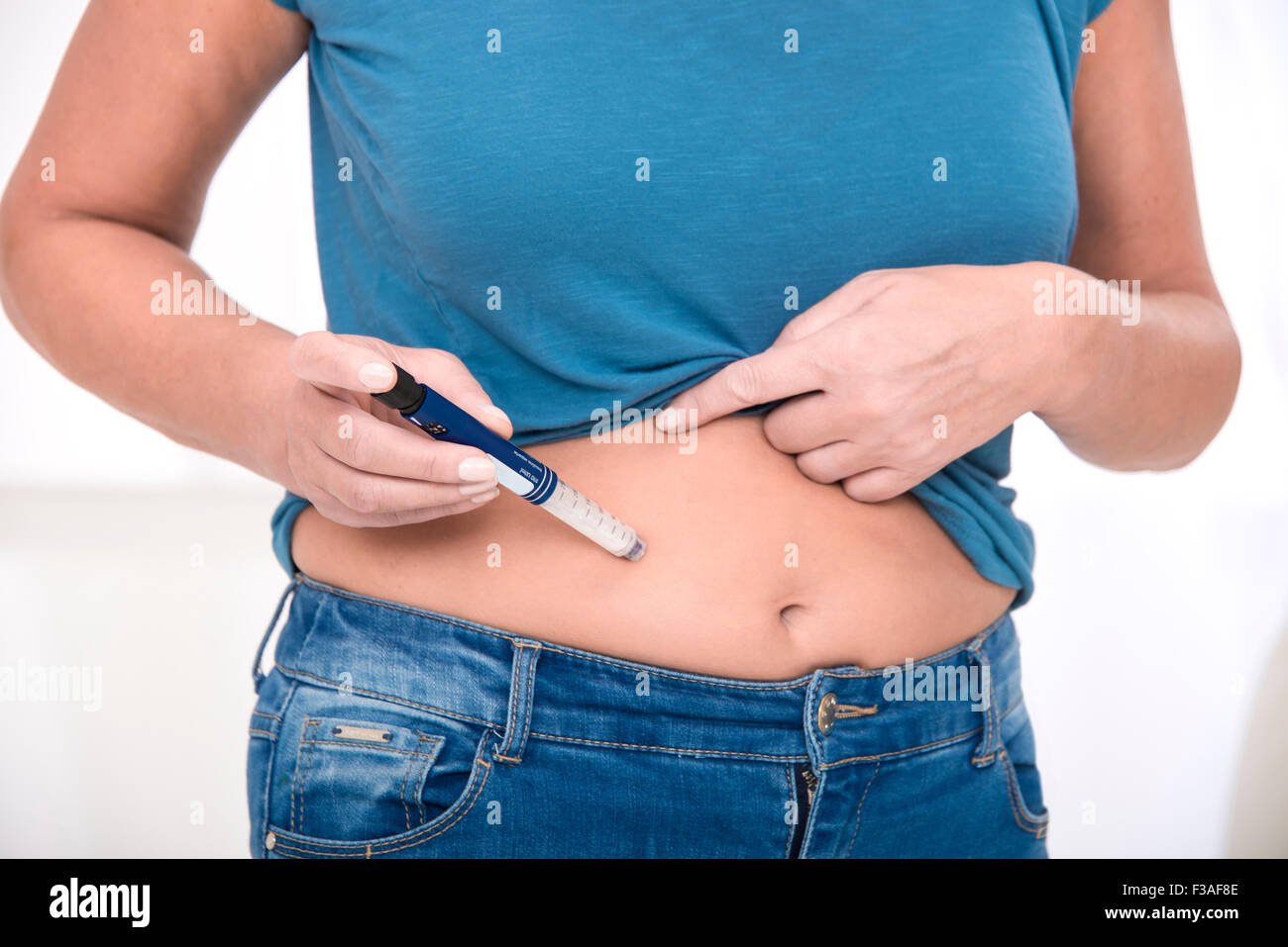 Injecting drugs into stomach hi-res stock photography and images - Alamy
