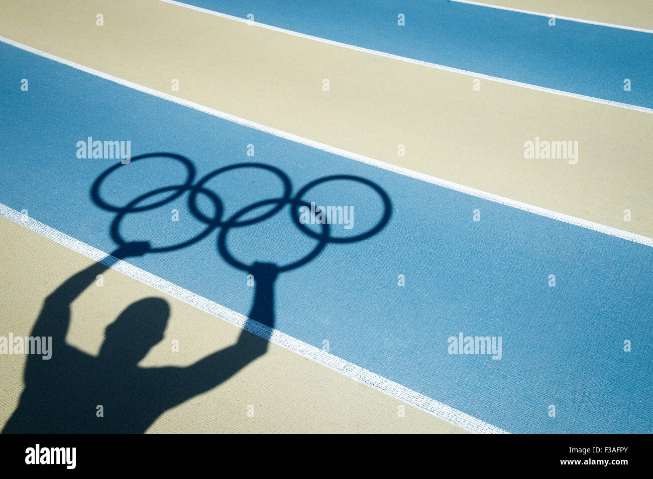 NEW YORK CITY, USA - AUGUST 20, 2015: Shadow of an athlete holds ...