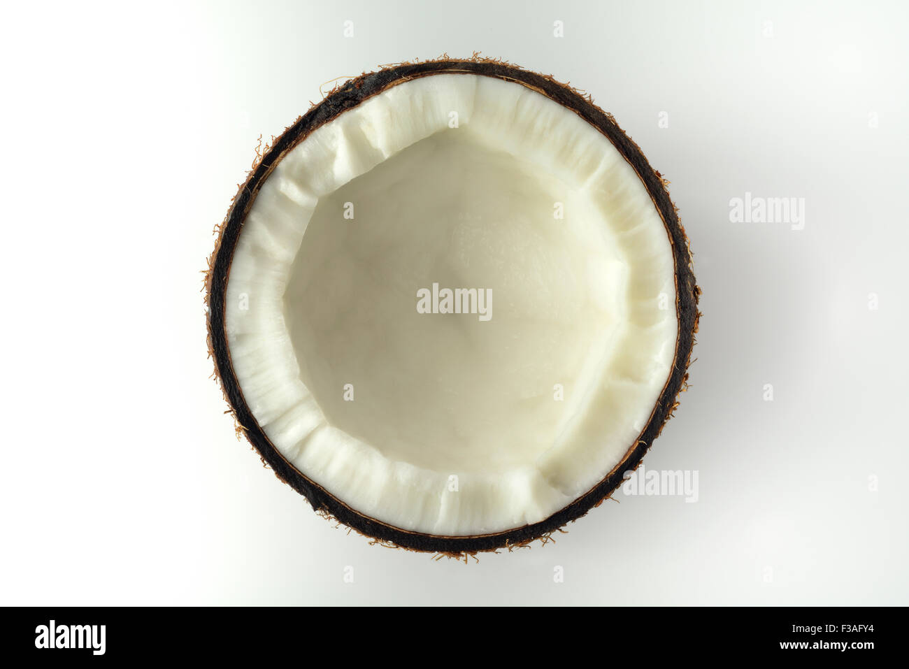 Top view of Halved Coconut Stock Photo - Alamy