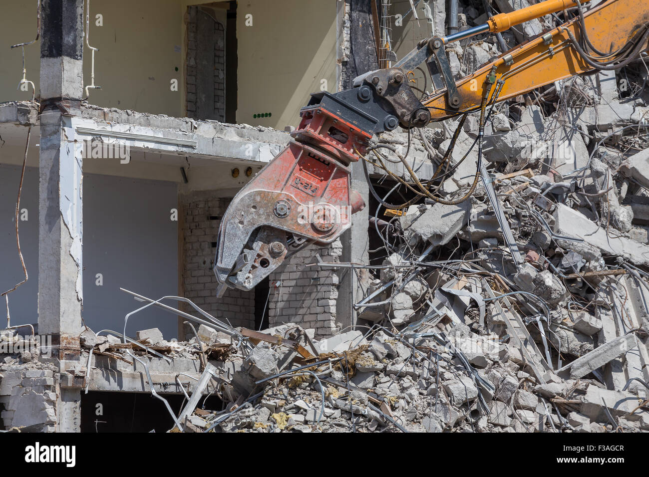 Pieces of Metal and Stone are Crumbling from Demolished Stock Photo - Alamy