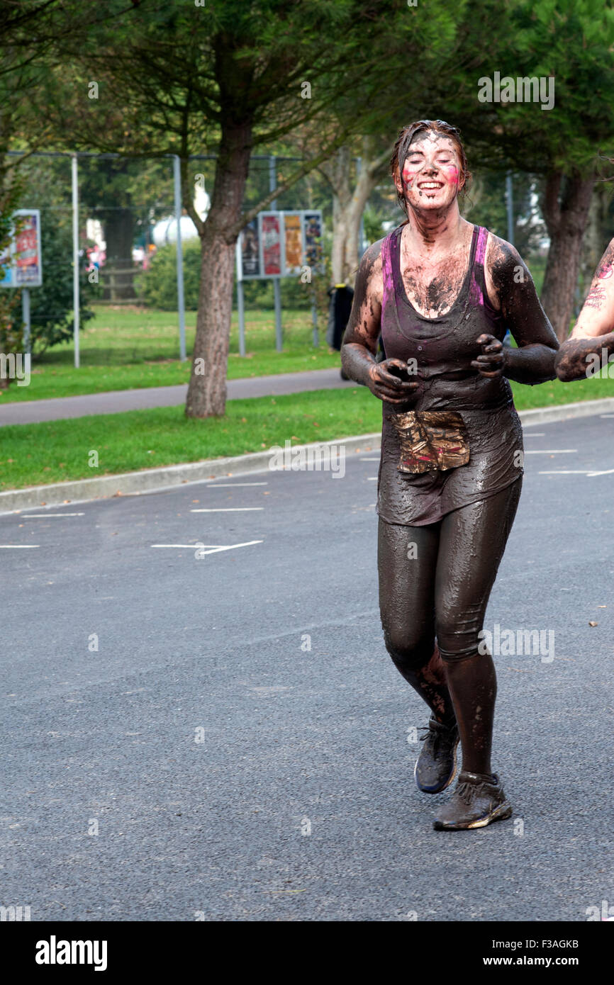 entrant at the 5k pretty muddy race for life in aid of cancer research ...