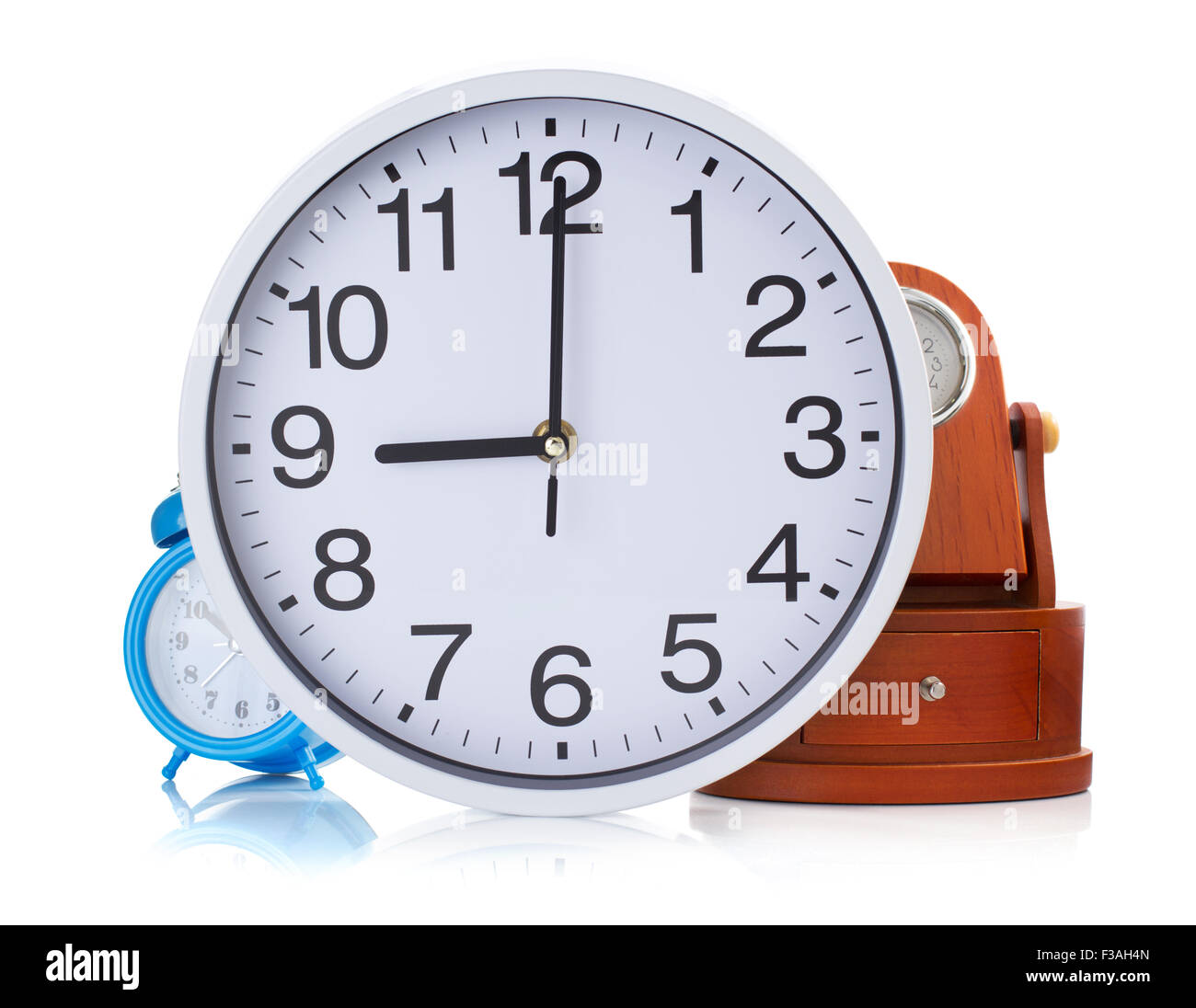 Wall clock on blue Cut Out Stock Images & Pictures - Alamy
