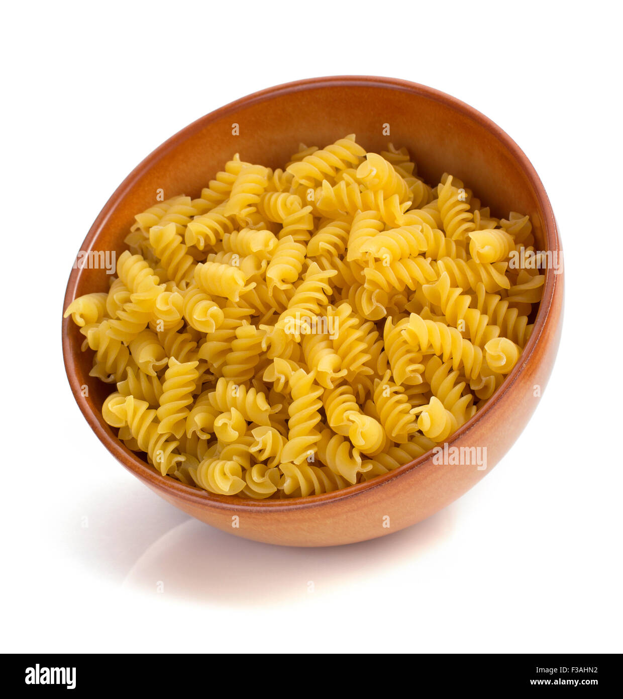pasta fusilli isolated on white background Stock Photo - Alamy