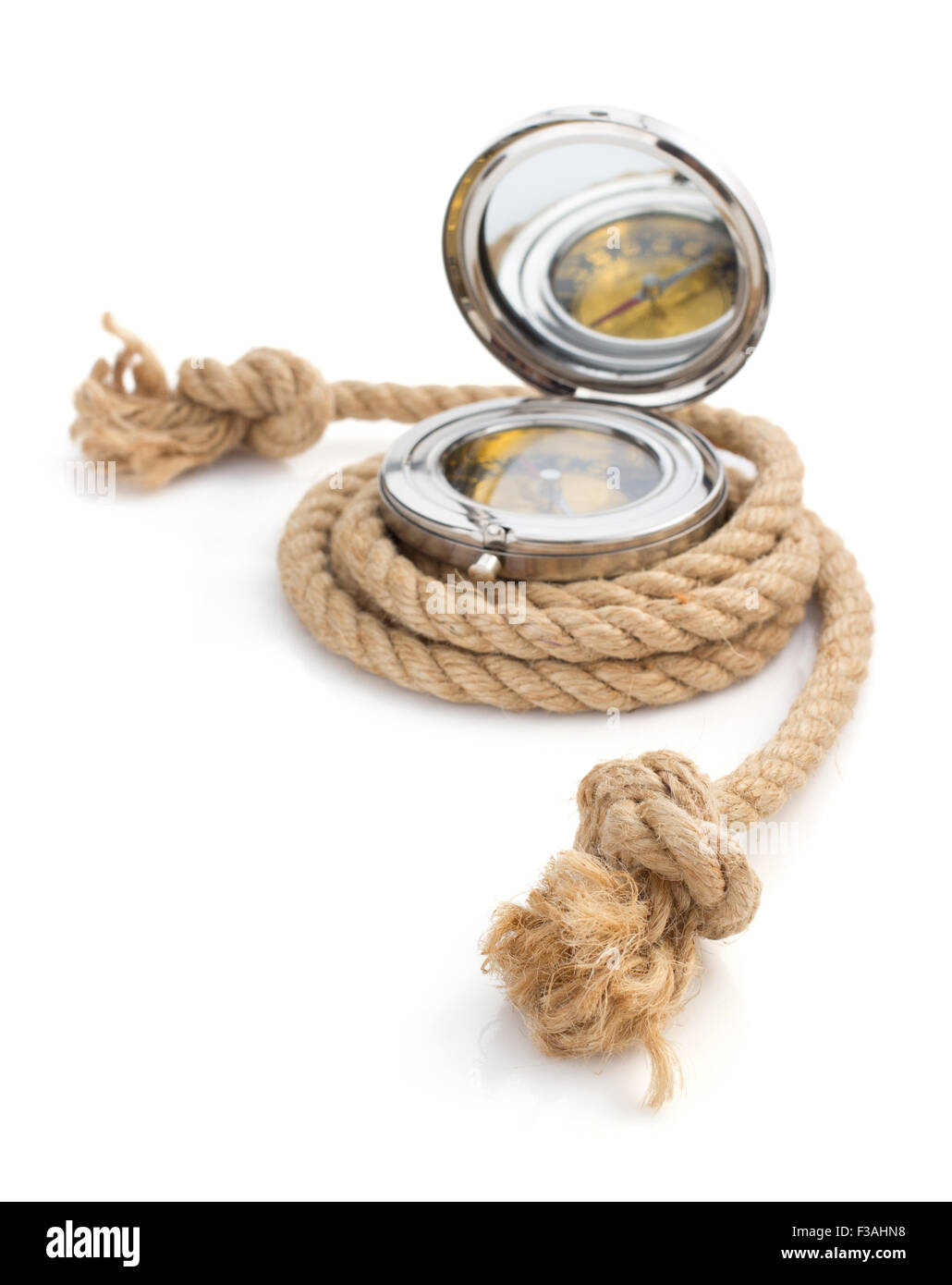 ship rope and compass isolated on white background Stock Photo - Alamy