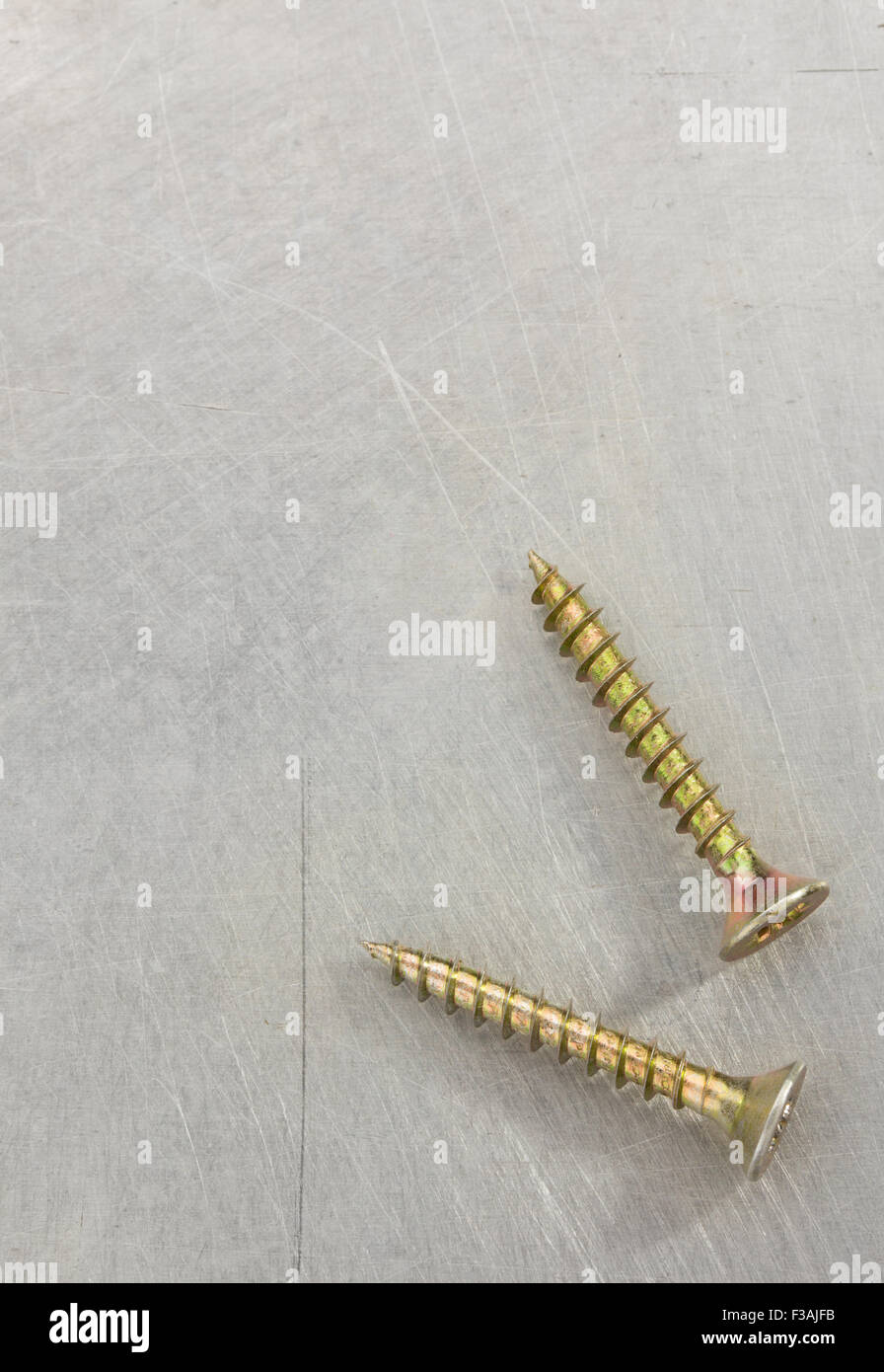 screws tool at metal background texture Stock Photo - Alamy