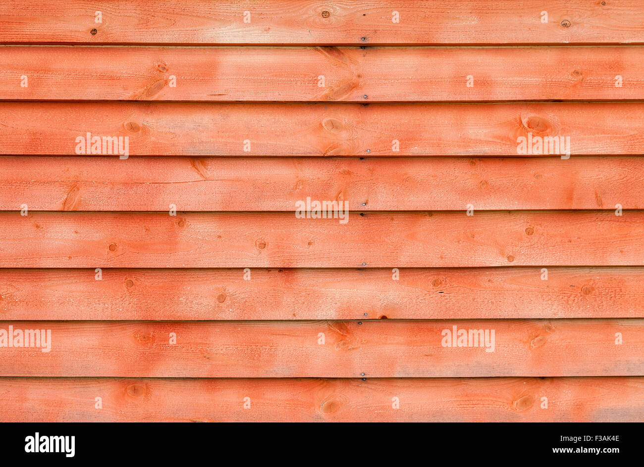 Red wooden boards with natural patterns as background Stock Photo - Alamy