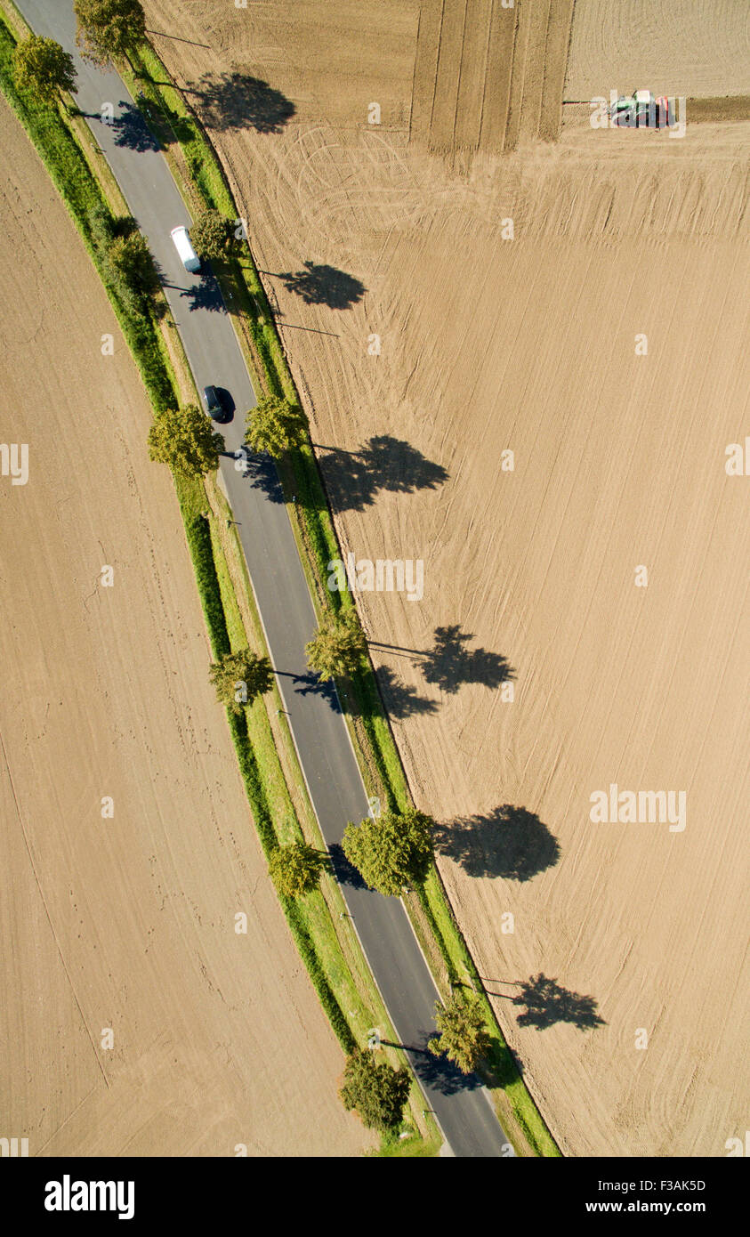 A farmer plows a field with his tractor in Schellerten, Germany, 1 ...