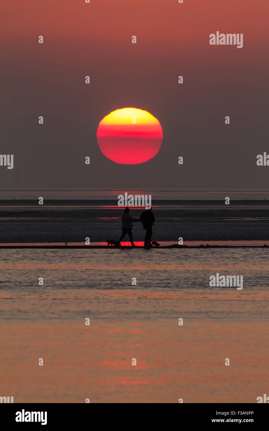 Sun setting over the River Dee, Wirral, England - October Stock Photo ...