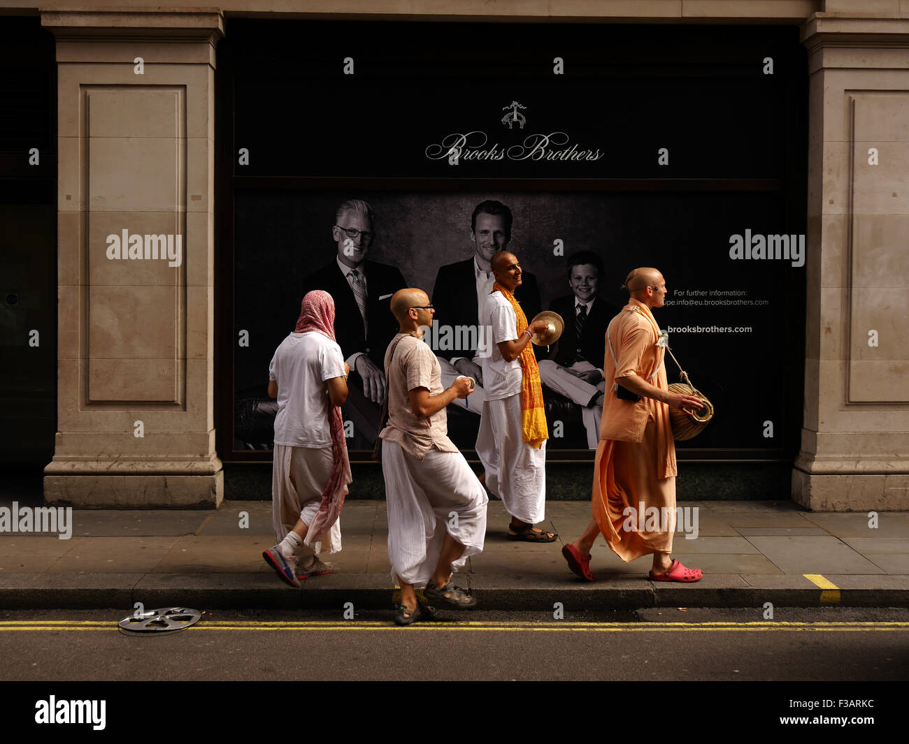 Hare Krishna walking downtown London Stock Photo - Alamy