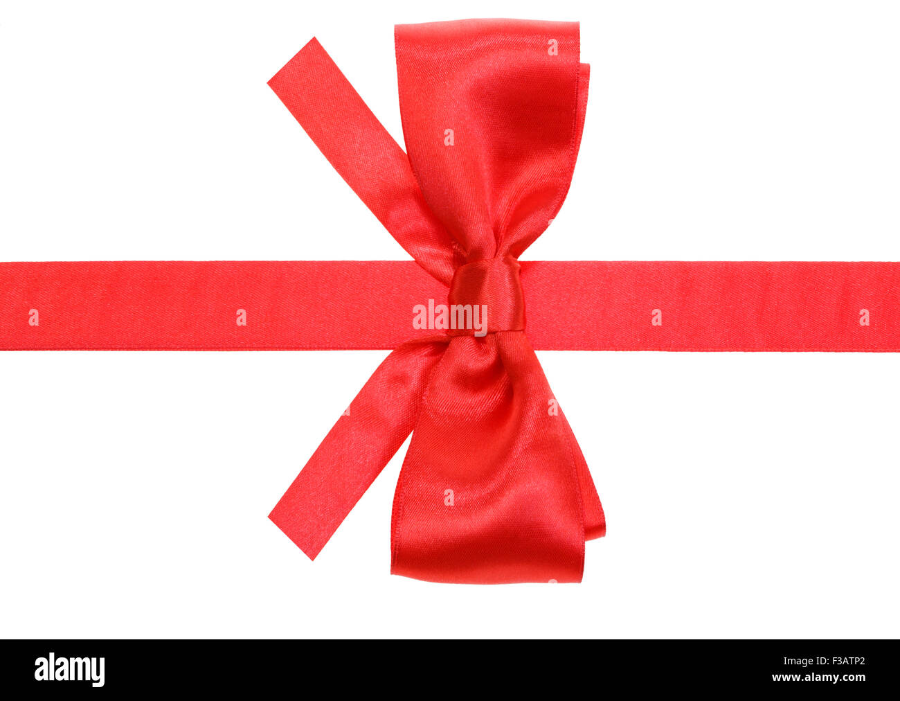 real red silk bow with square cut ends on ribbon isolated on white ...