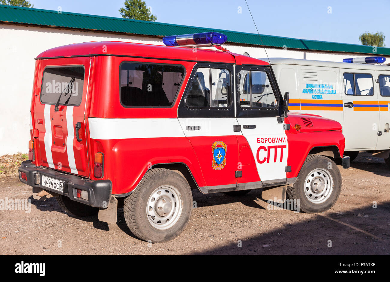 Rescue car parked up in the street. Text on russian: "Professional ...