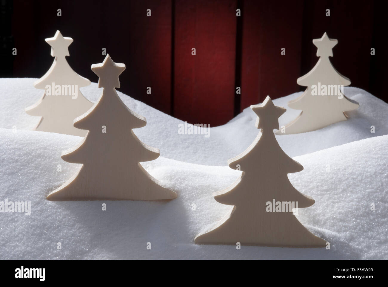 Four White Christmas Trees On Snow. White Snowy Scenery As Christmas ...
