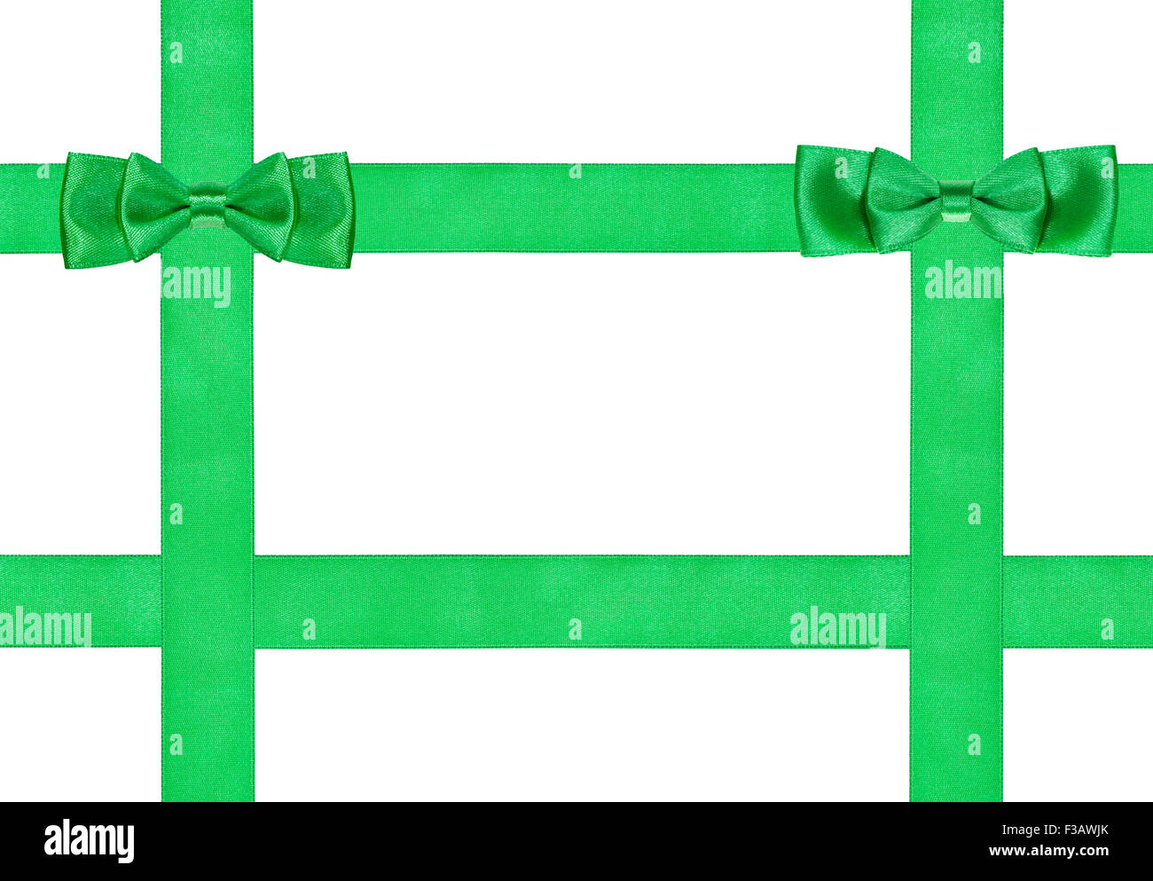two double green bow knots on four silk bands isolated on white ...
