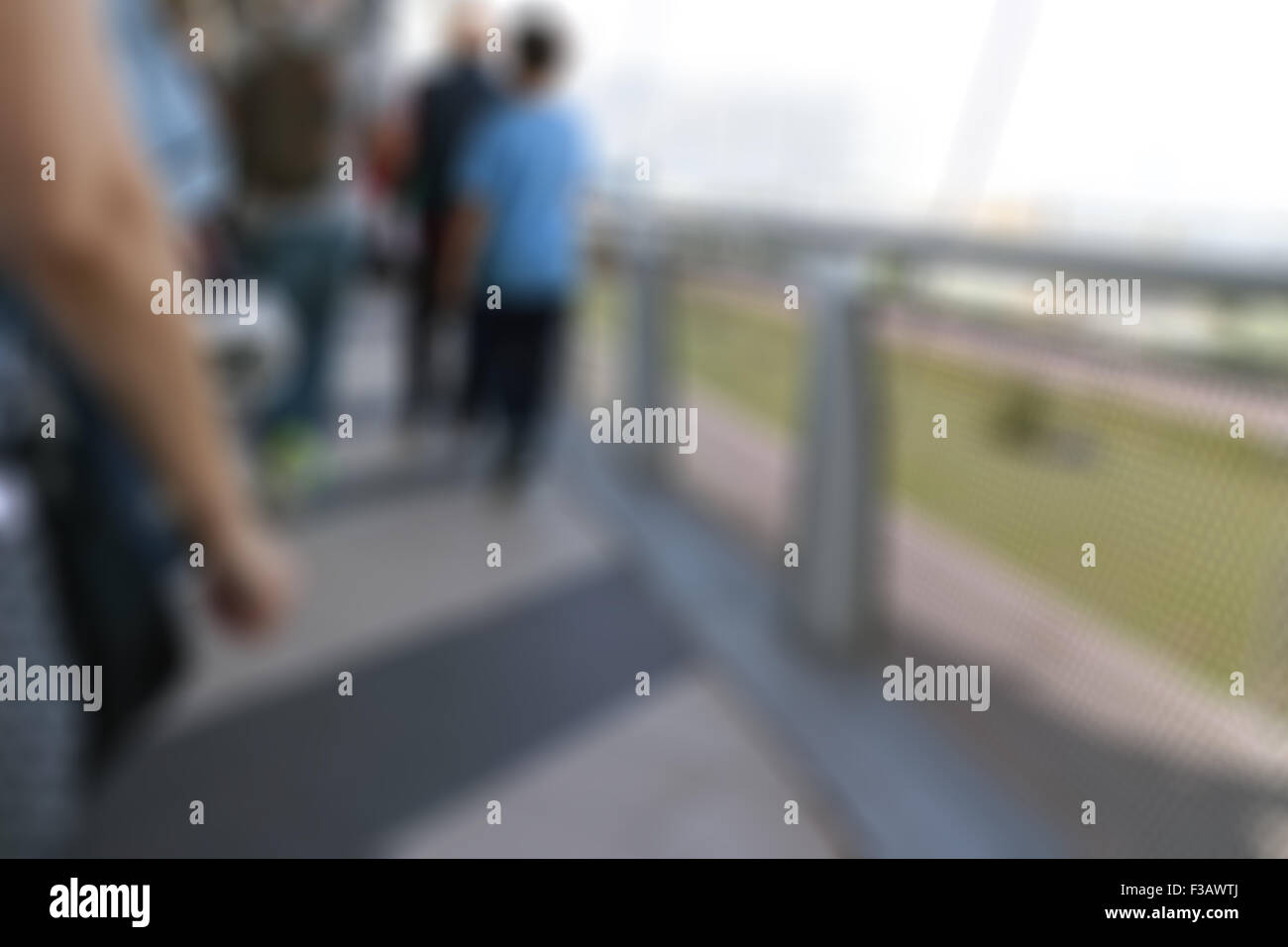 A group of blurred people walking Stock Photo - Alamy