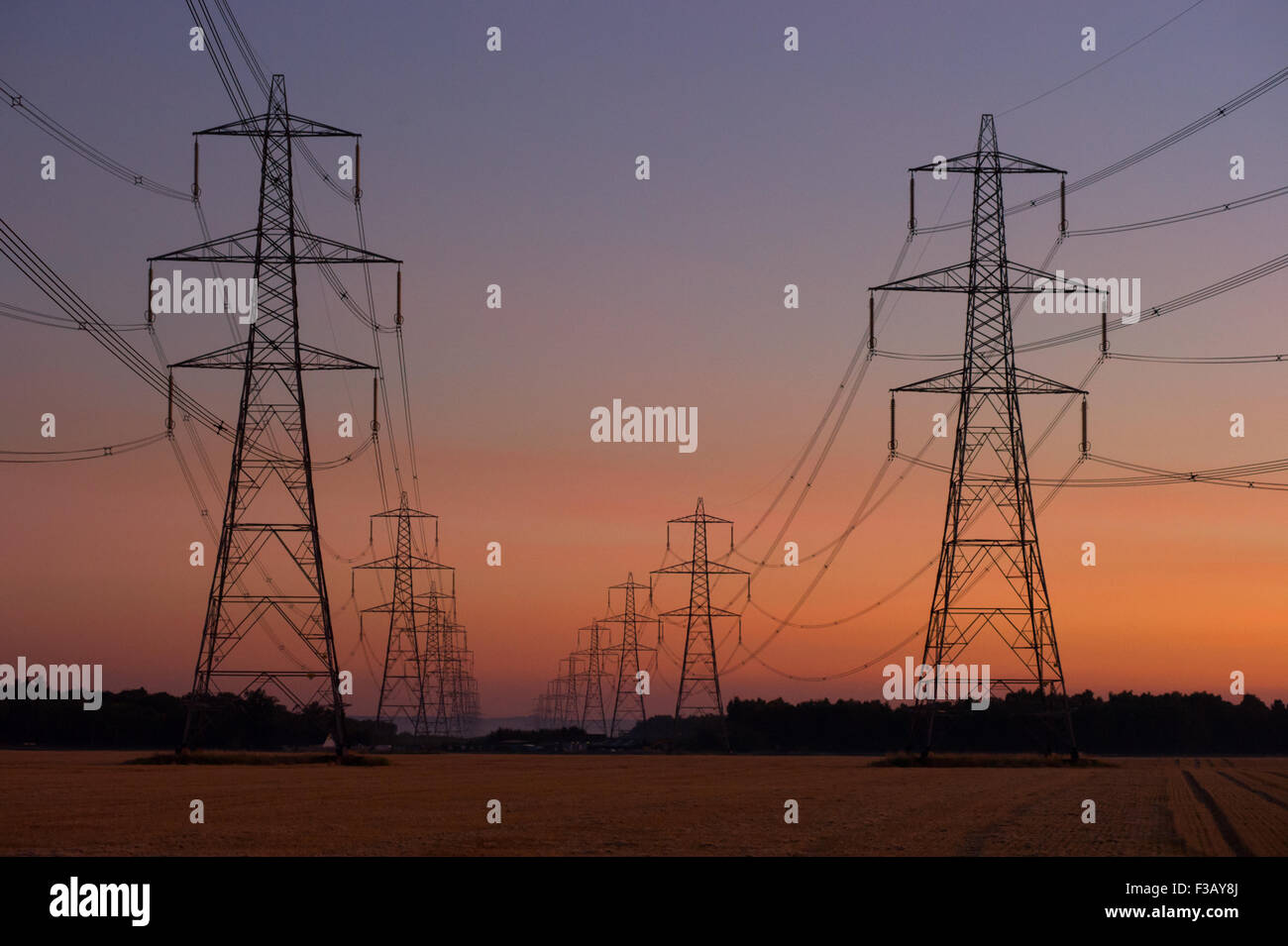 Pylons at sunset near Stirling, Scotland, UK Stock Photo - Alamy