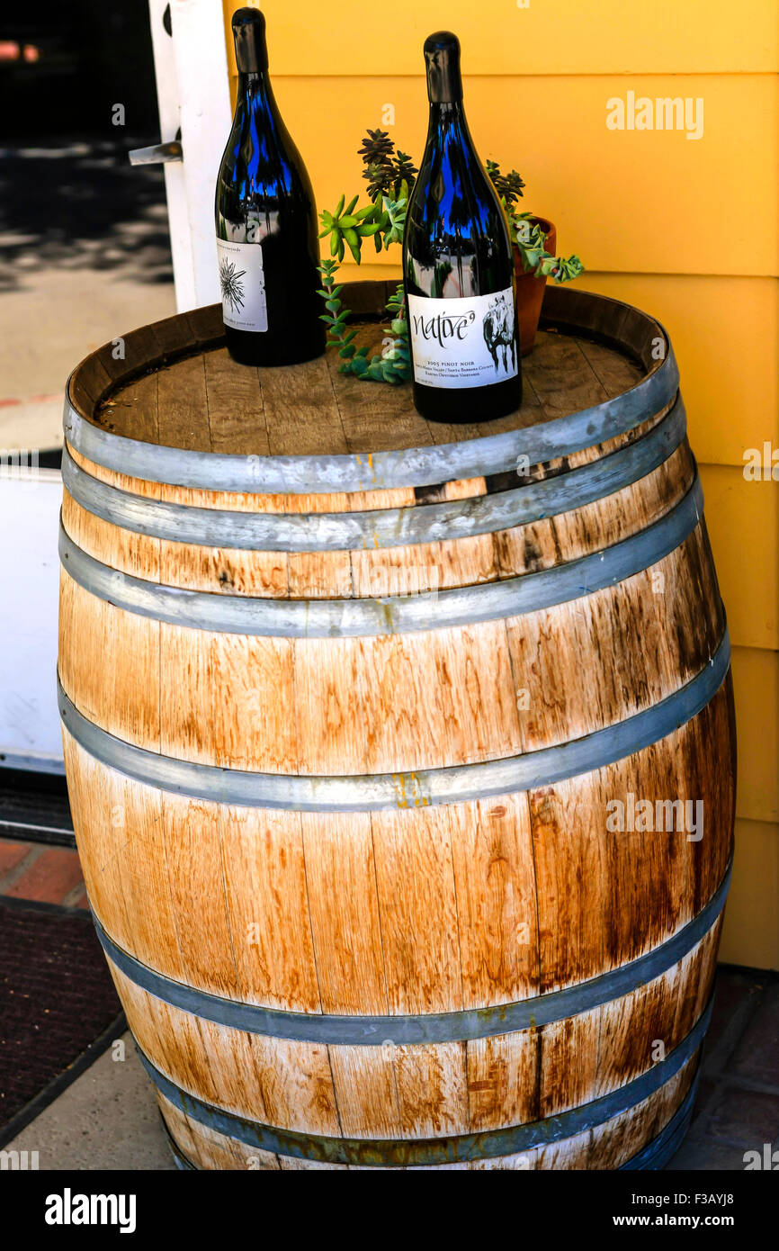 Blue wine bottles and barrel outside Alta Maria store in Los Olivos, a ...