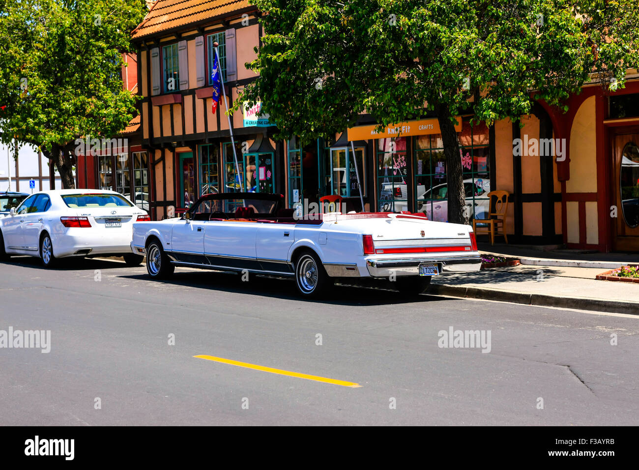 A stretch convertible Cadillac tourist limo in the Danish-styled ...