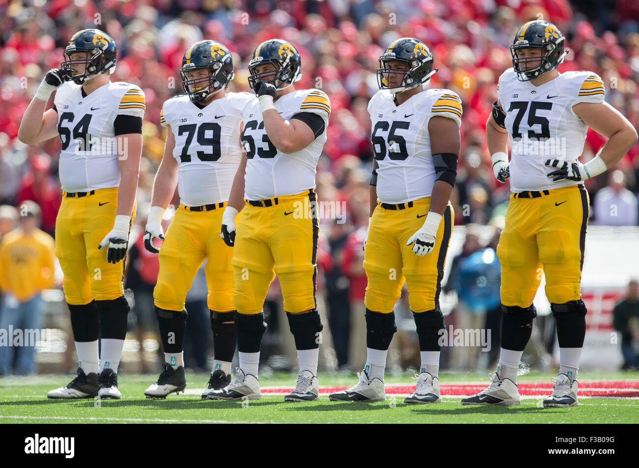 Madison, WI, USA. 3rd Oct, 2015. Iowa front five during the NCAA ...