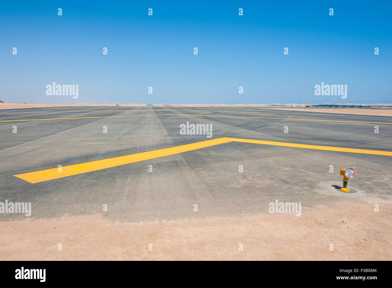 Row of approach lights off the end of an airfield airport runway Stock ...