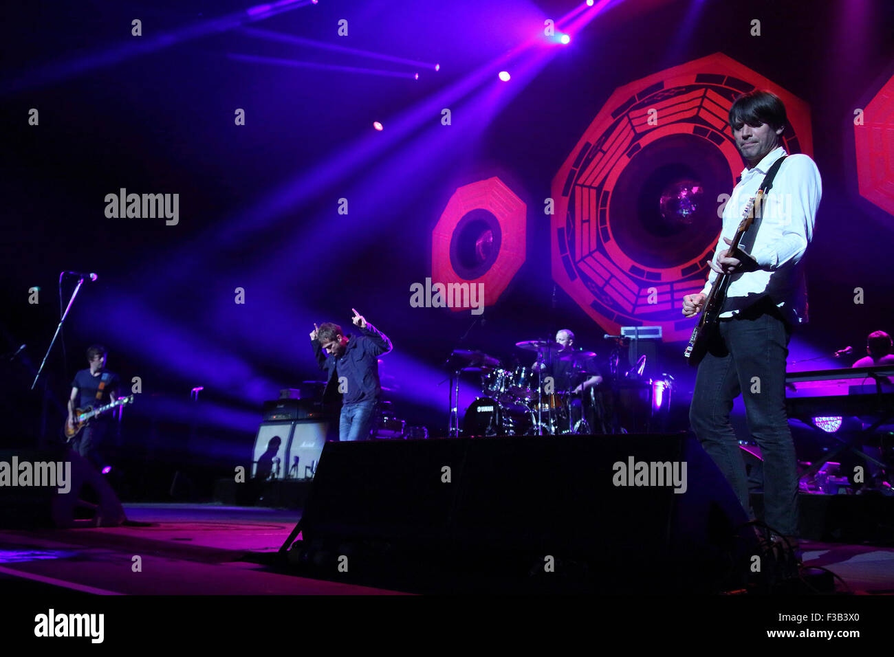 Blur performing live on stage at Perth Arena Featuring: Alex James ...