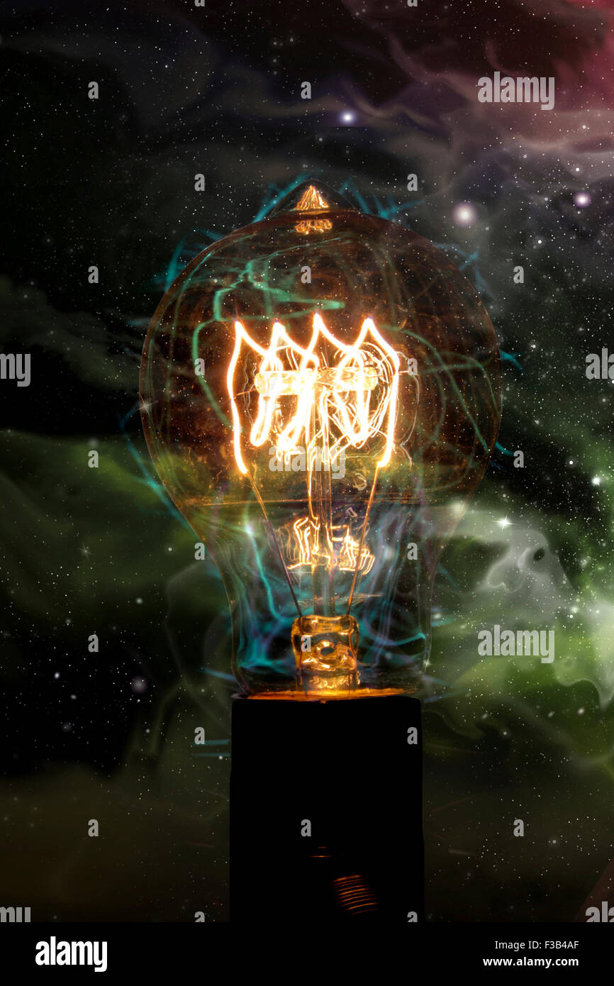 Edison style light bulbs against beautiful universe of stars and ...