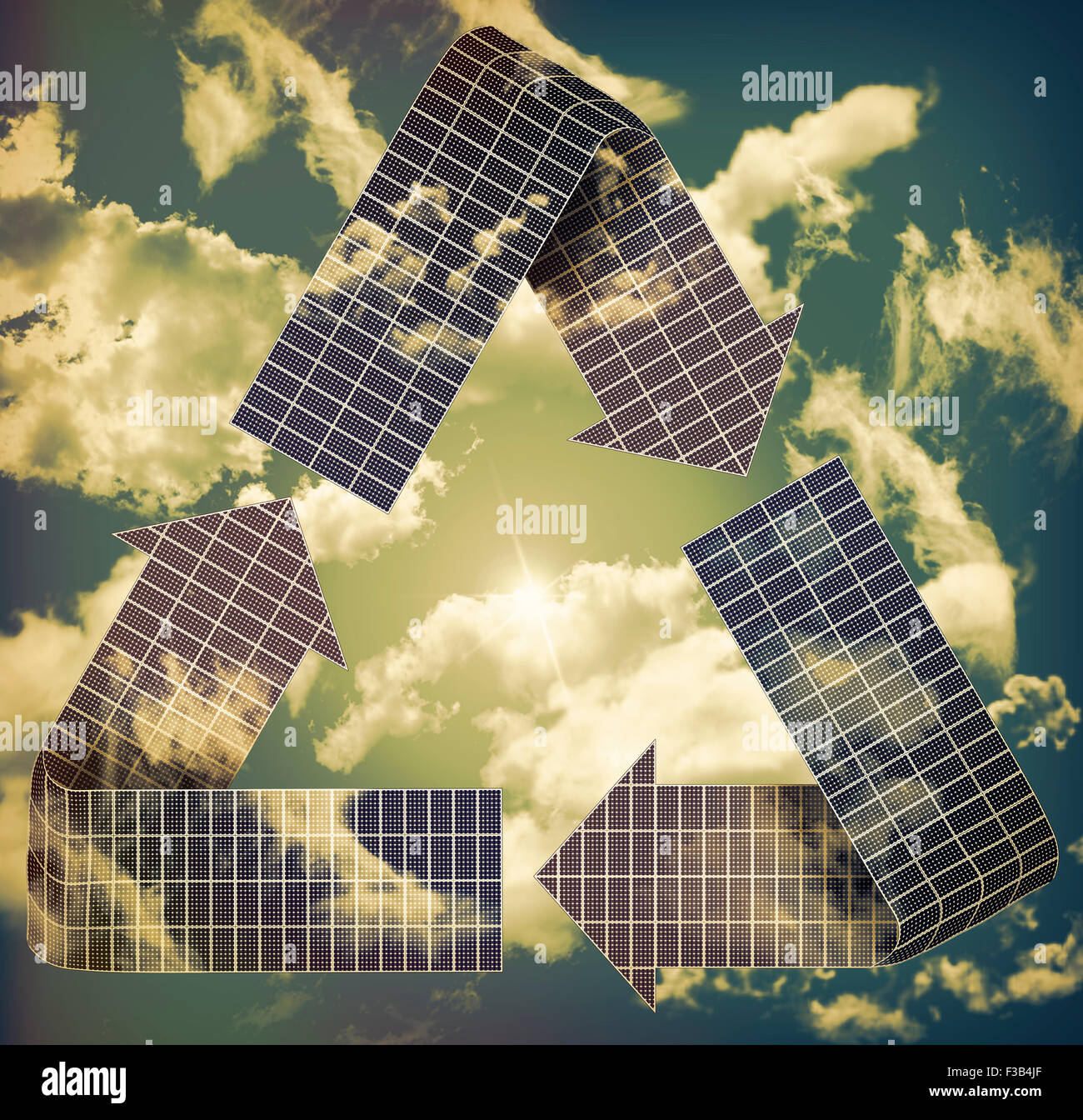 Several solar panels shaped to form recycle symbol Stock Photo - Alamy