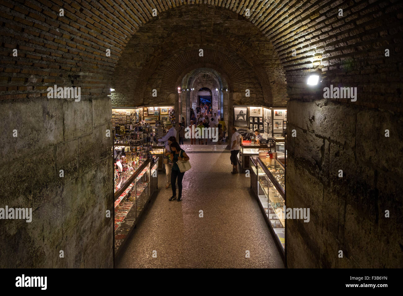 Dimly lit underground souvenir stall complex at the Diocletian's Palace ...