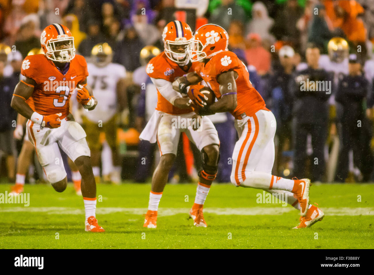 Clemson Tigers quarterback Deshaun Watson (4) hands off to Clemson ...