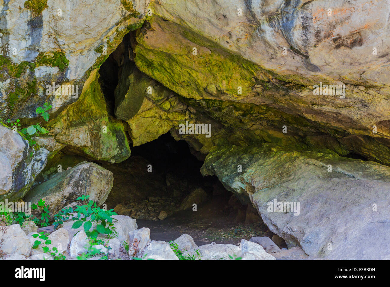 Cave entrance with natural light, Caucasus mountains Stock Photo - Alamy