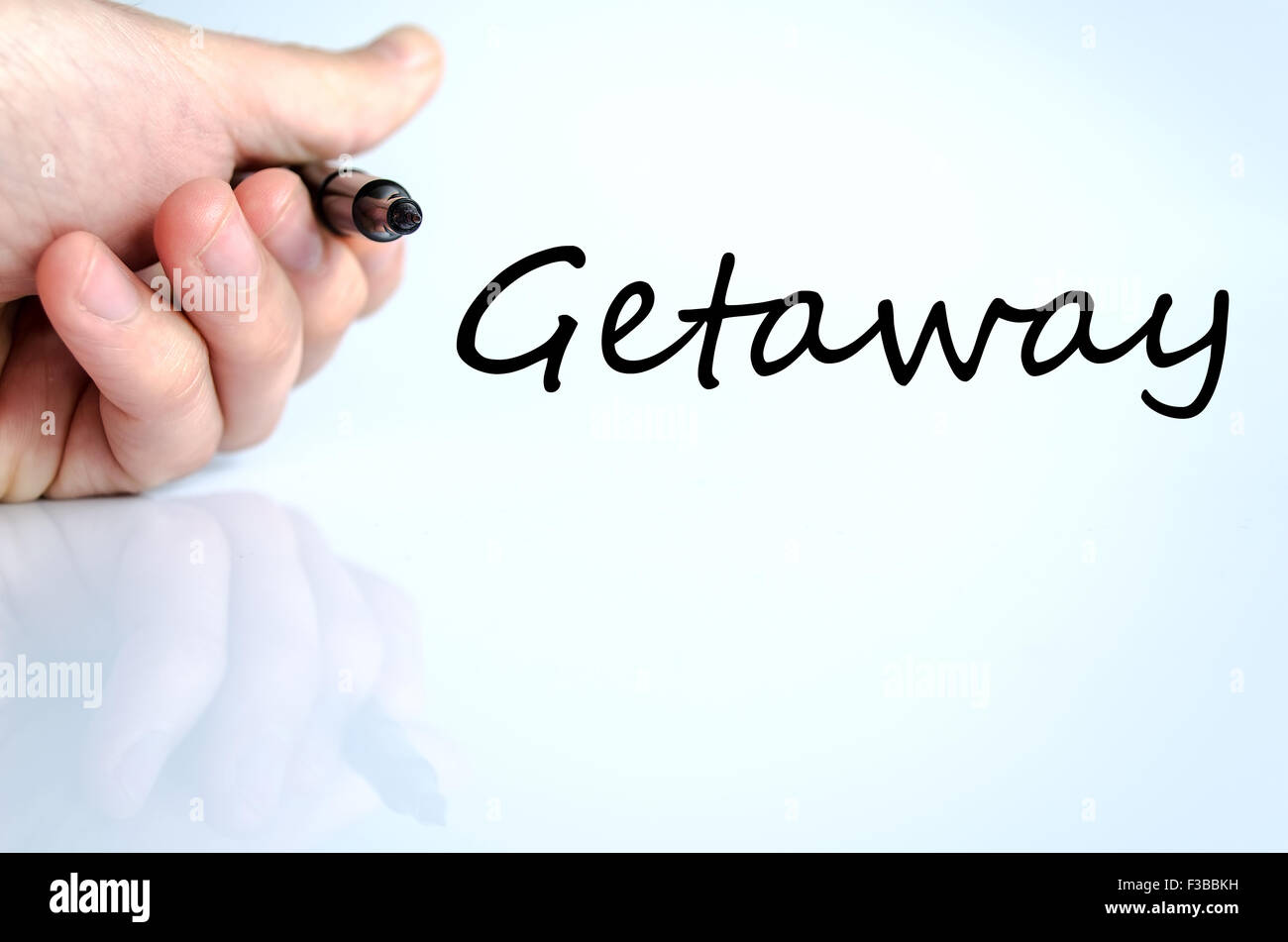 Getaway text concept isolated over white background Stock Photo - Alamy
