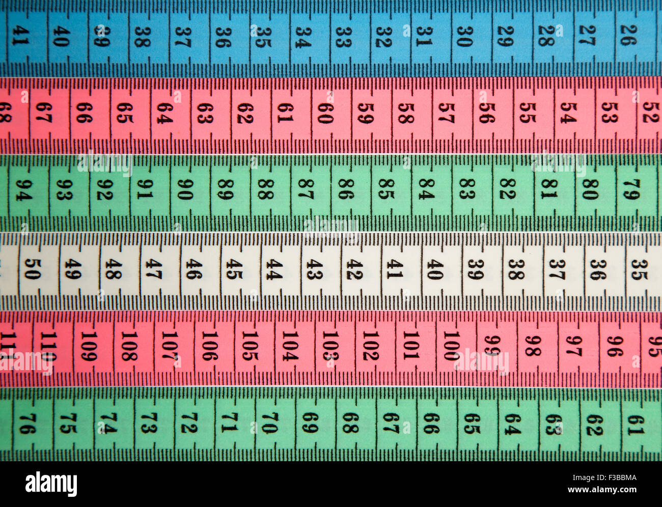 Different colors of Tailor measuring tapes Stock Photo - Alamy
